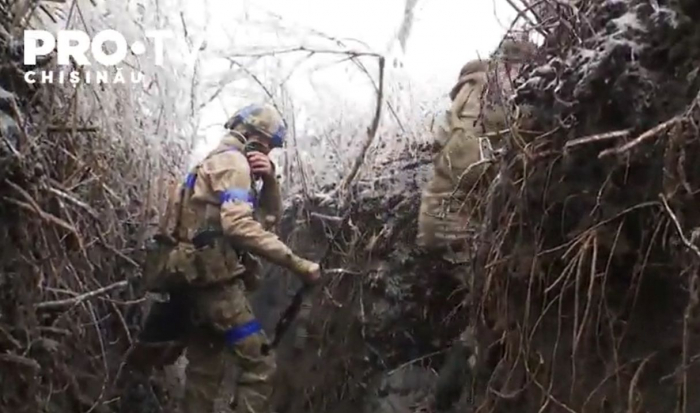 Liniile frontului din estul Ucrainei sunt pline de zapada, iar lupte ...